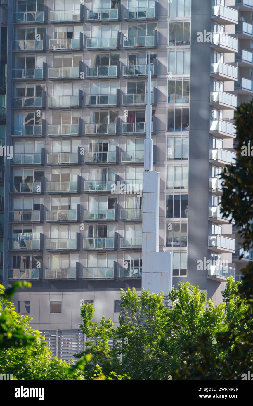 Abstract apartment building exterior view showing glass windows and ...
