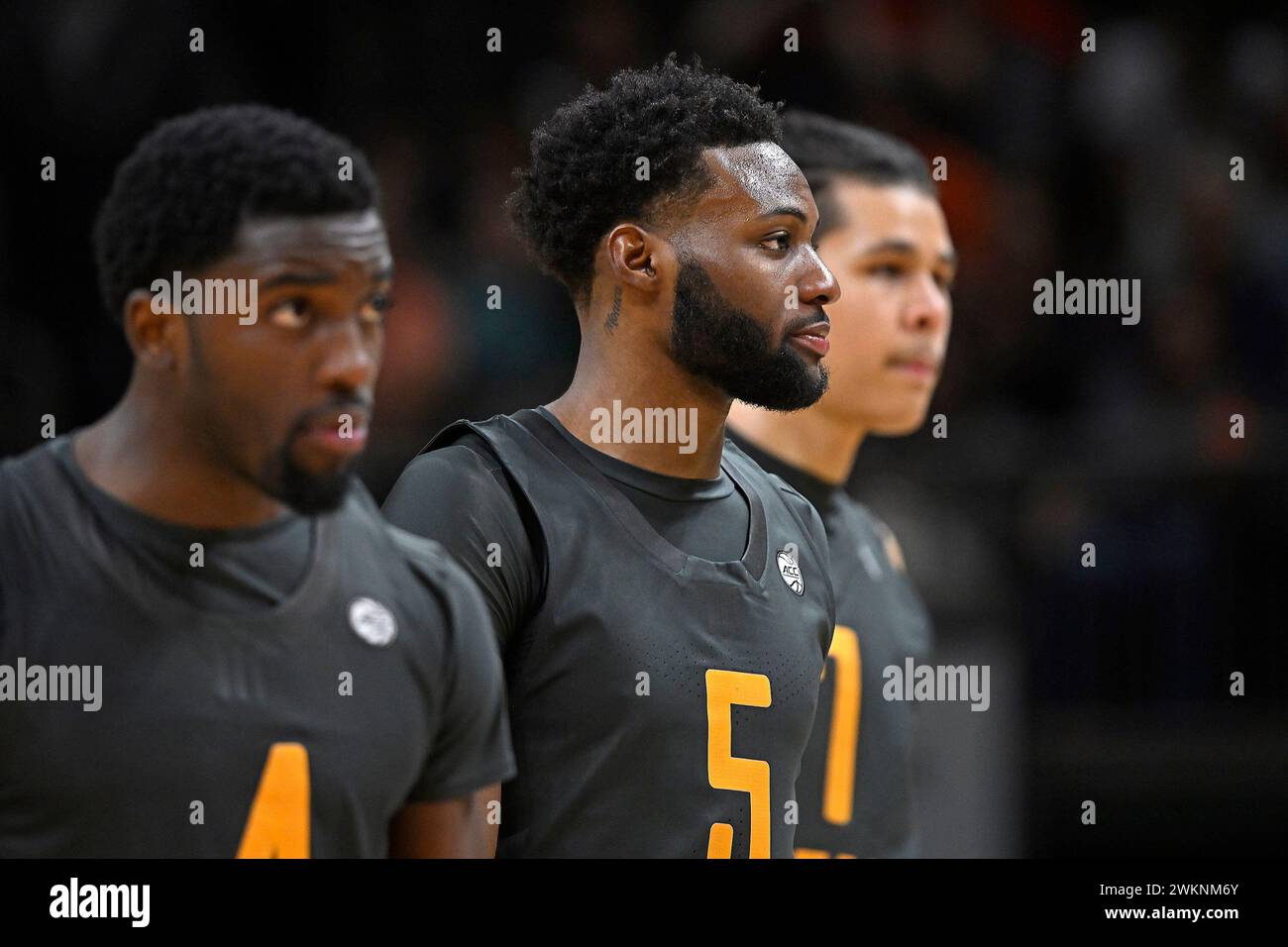 CORAL GABLES, FL - FEBRUARY 21: Miami guard Wooga Poplar (5), flanked ...