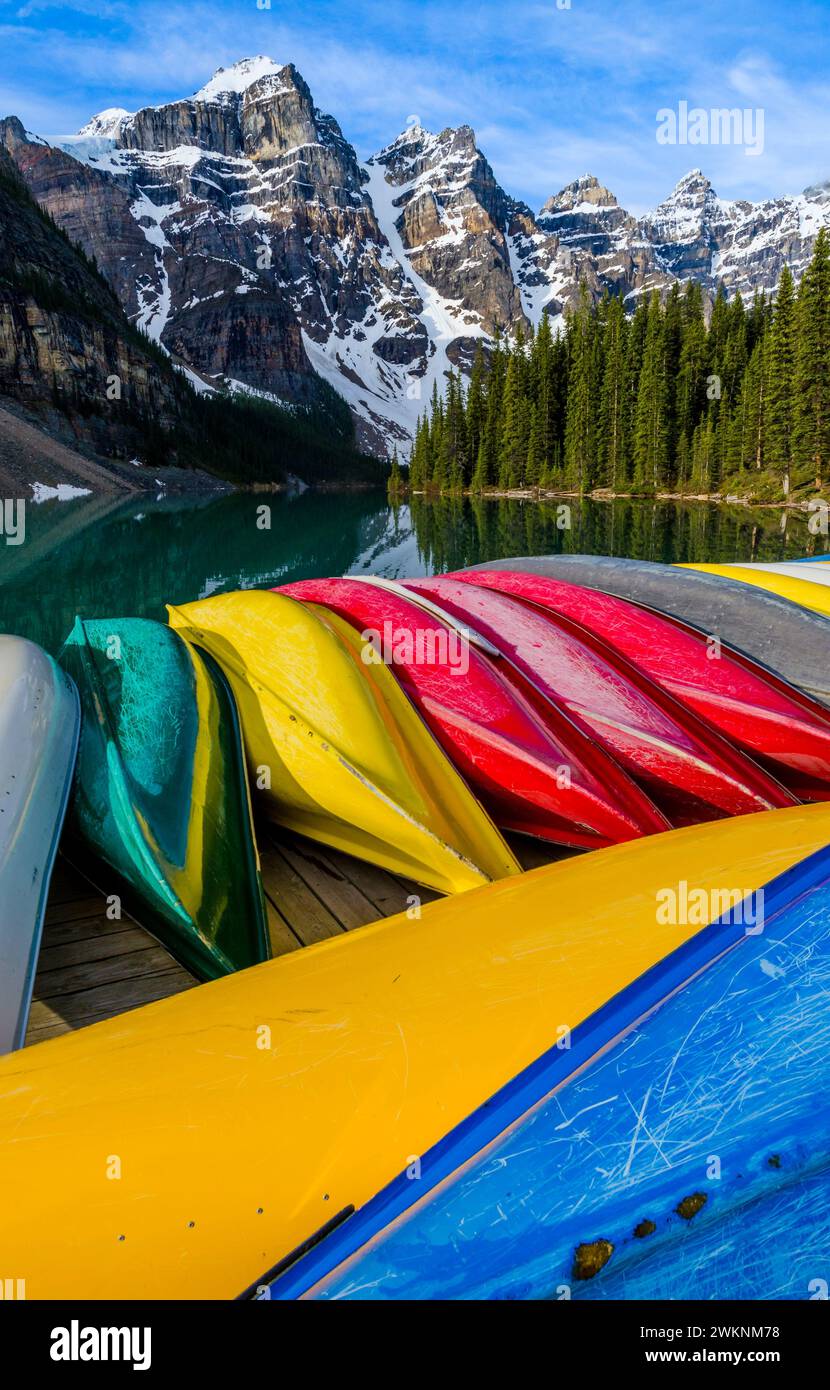 Colorful canoes, Moraine Lake, Banff National Park, Alberta, Canada ...