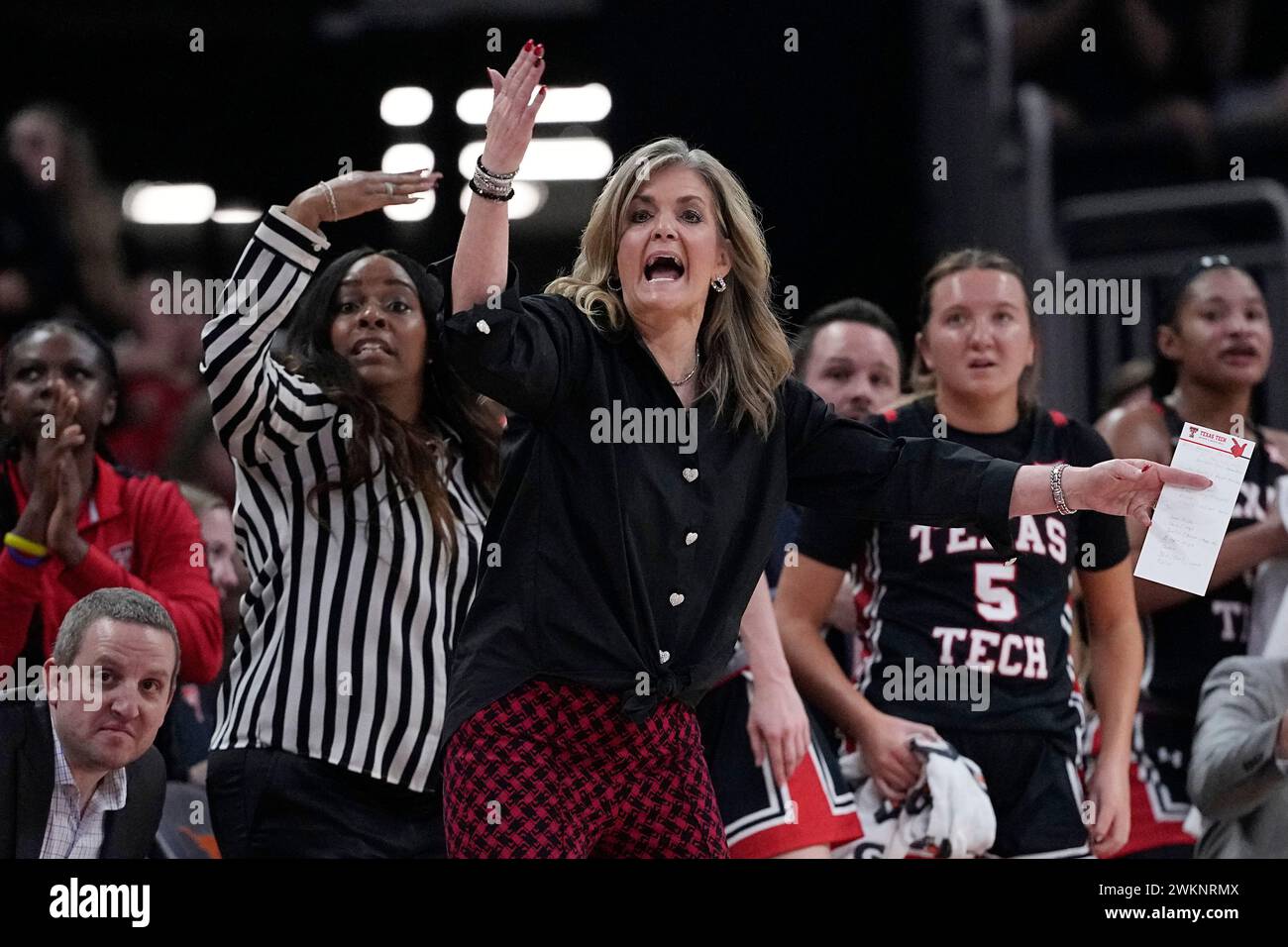 Texas Tech head coach Krista Gerlich, center, signals to her team ...