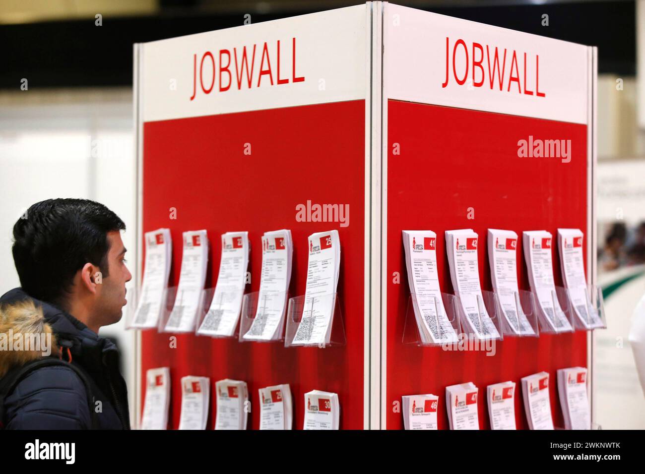 Job offers are posted on a job wall at the job exchange for refugees ...