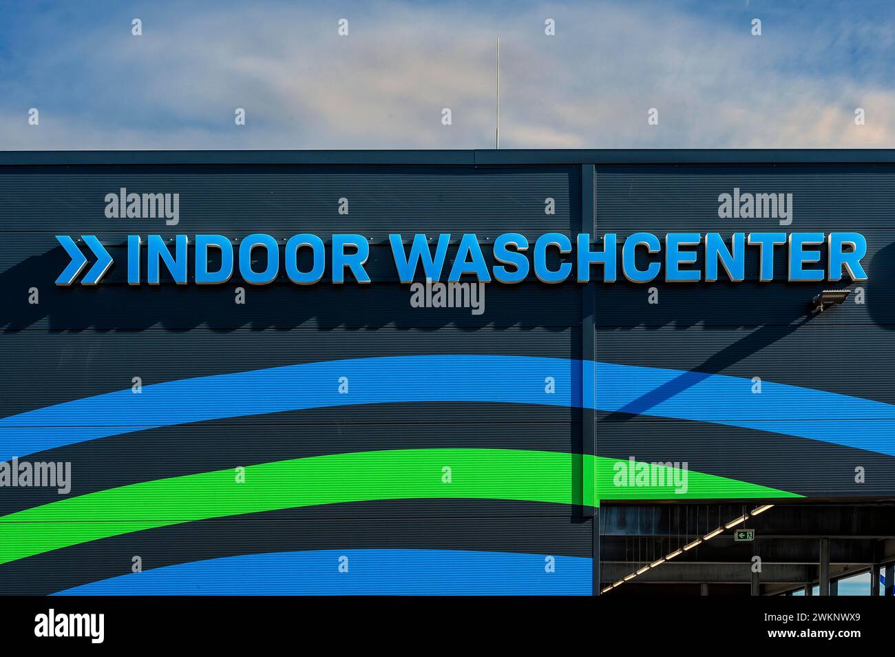 Lettering on blue-green facade, indoor washing centre, Kempten, Bavaria ...