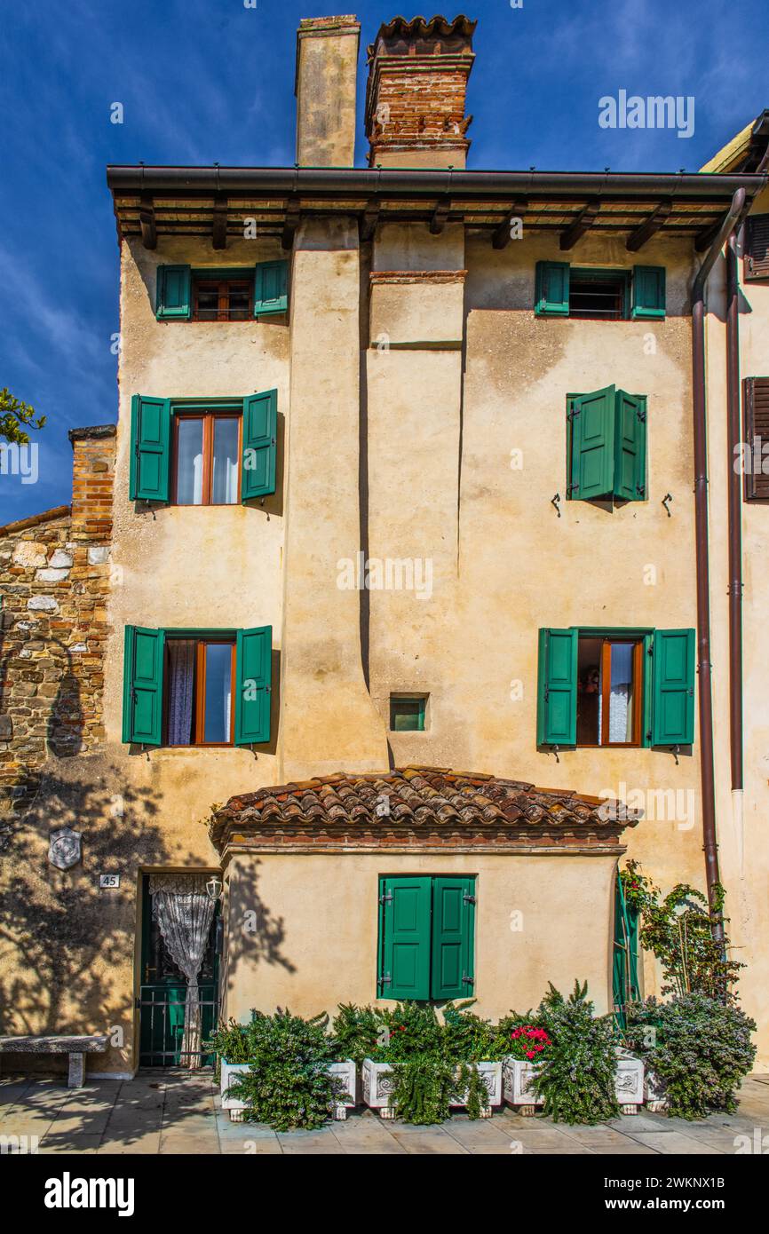 Old town houses, Citta vecchia, island of Grado, north coast of the ...