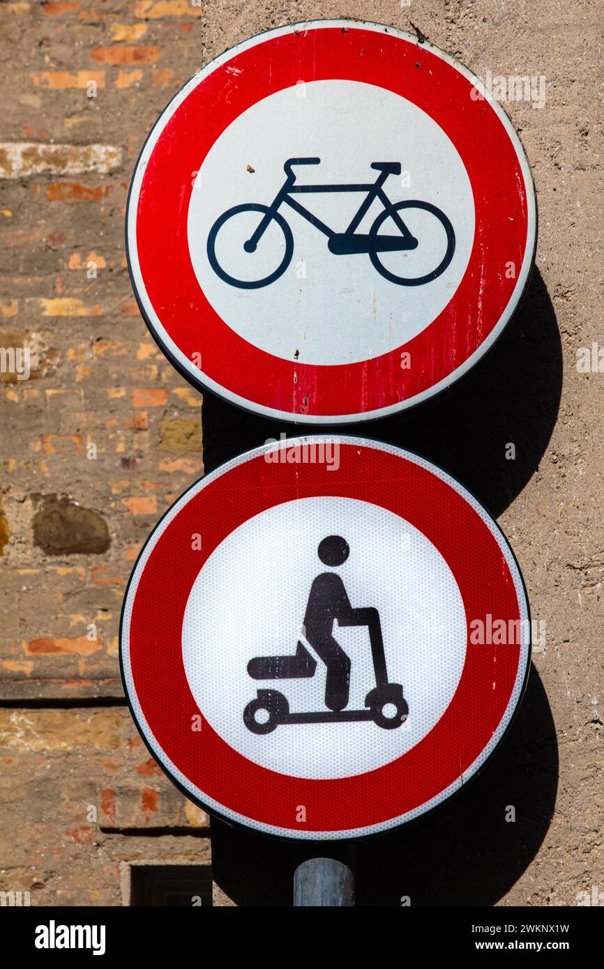Old town signs against bicycles and e-scooters, Grado Island, north ...