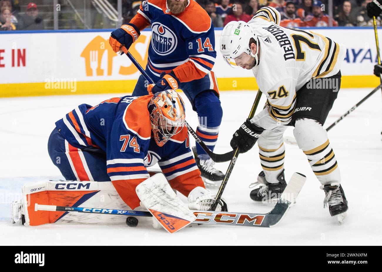 Boston Bruins' Jake DeBrusk (74) is stopped by Edmonton Oilers goalie ...