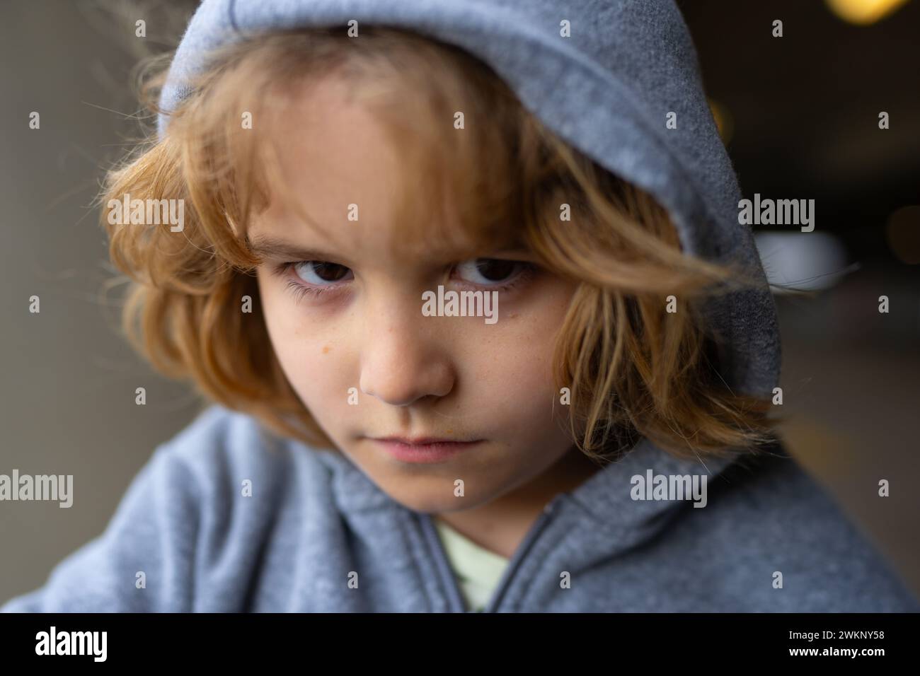 Kid boy in hoodie fighting. Little kid boy fighting outside. Angry ...
