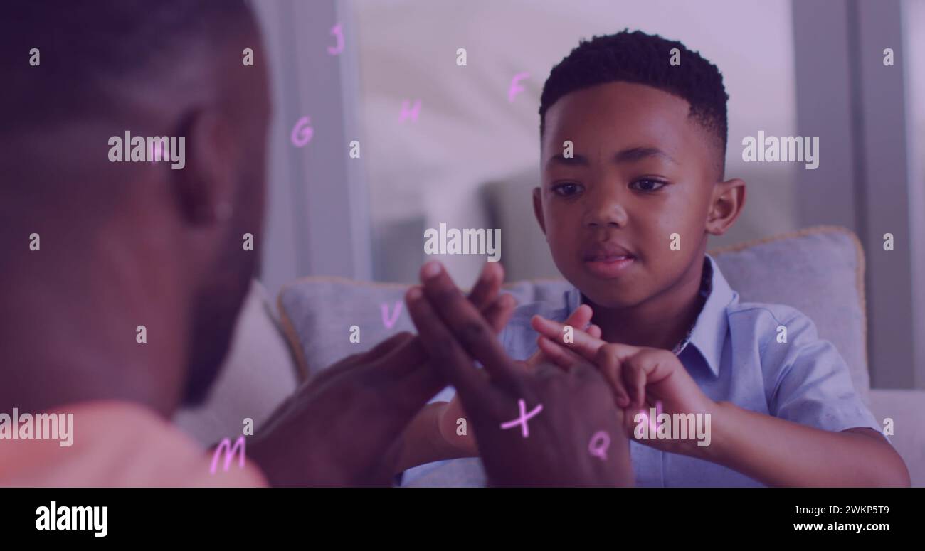 Image of letters floating over happy african american father and son ...