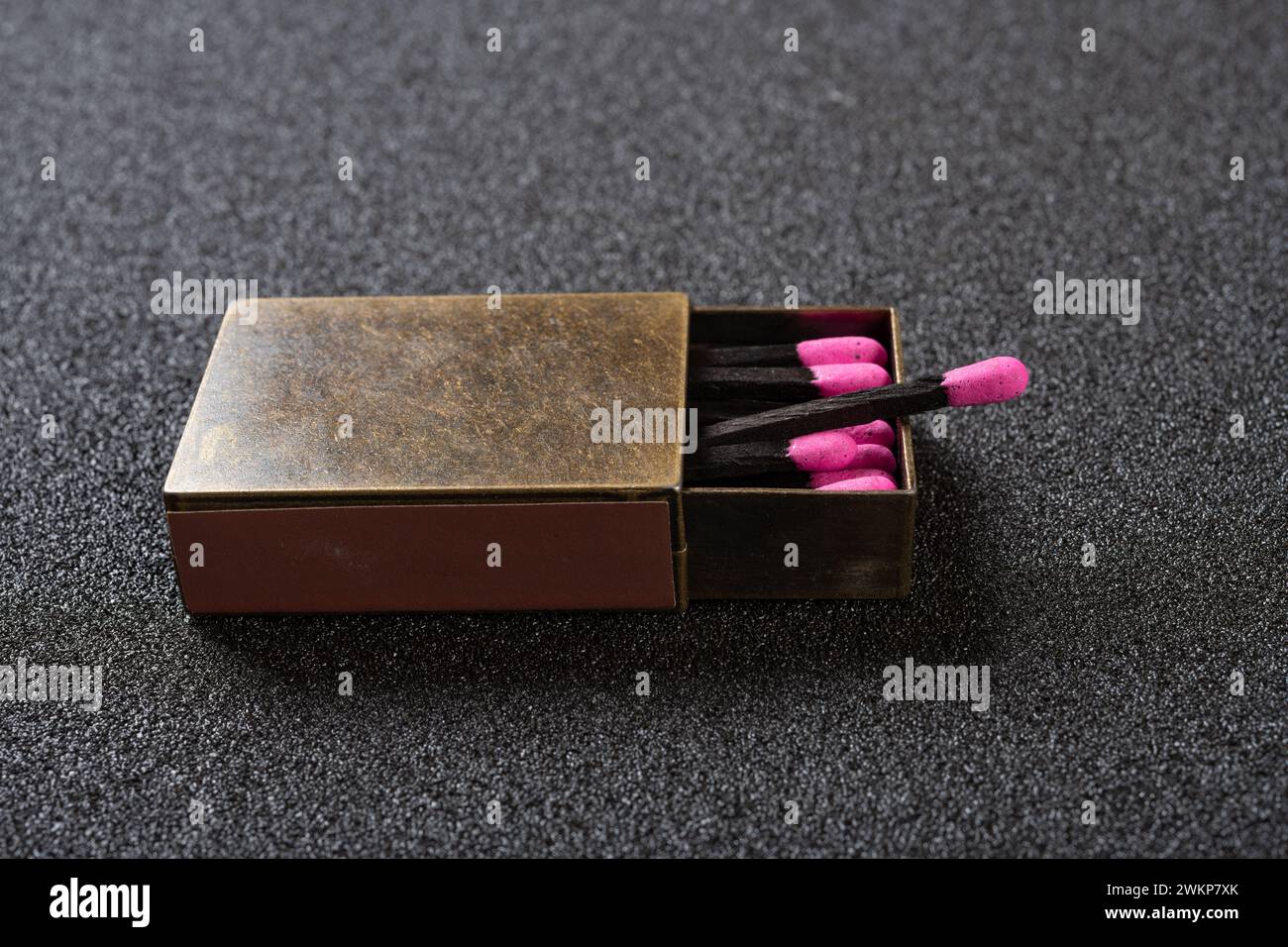 angle view copper matchbox with pink color match sticks at horizontal composition Stock Photo ...