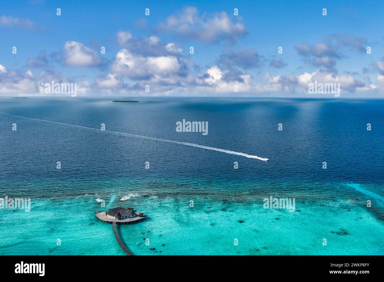 Beautiful aerial view of Maldives shore, jetty villa seaplane top view ...