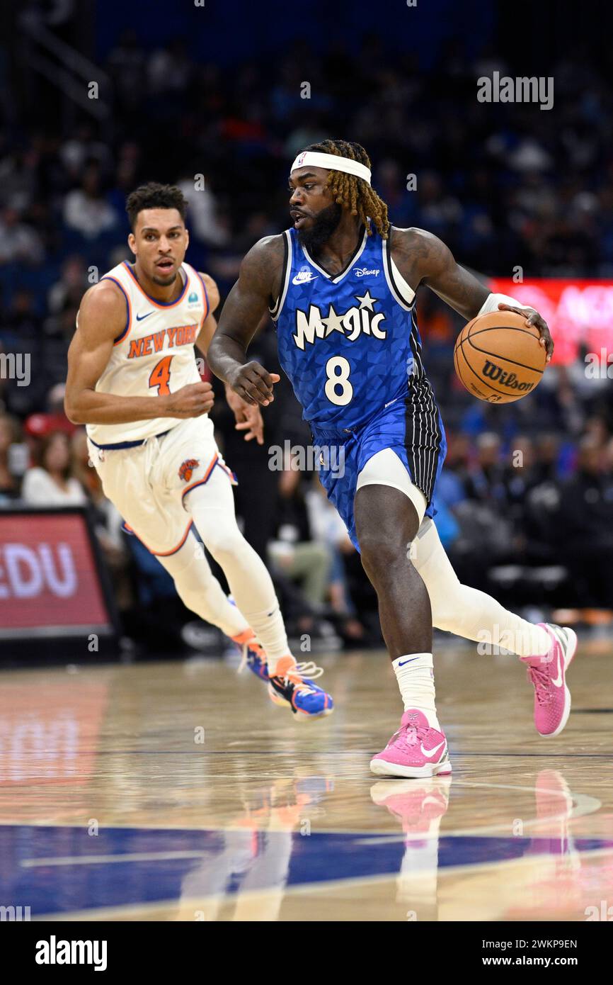 Orlando Magic guard Kevon Harris (8) drives past New York Knicks guard ...