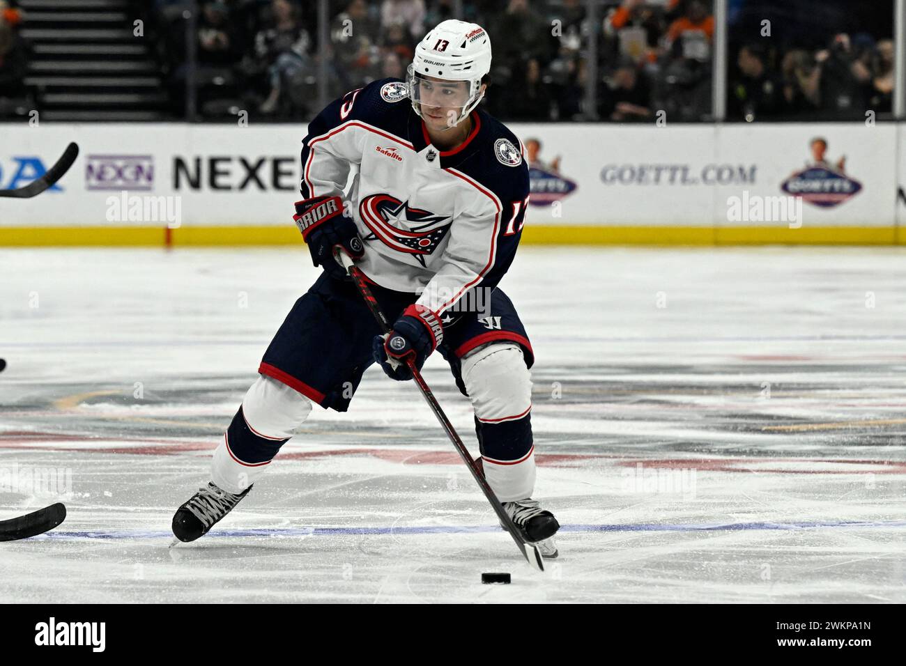Columbus Blue Jackets left wing Johnny Gaudreau (13) controls the puck ...