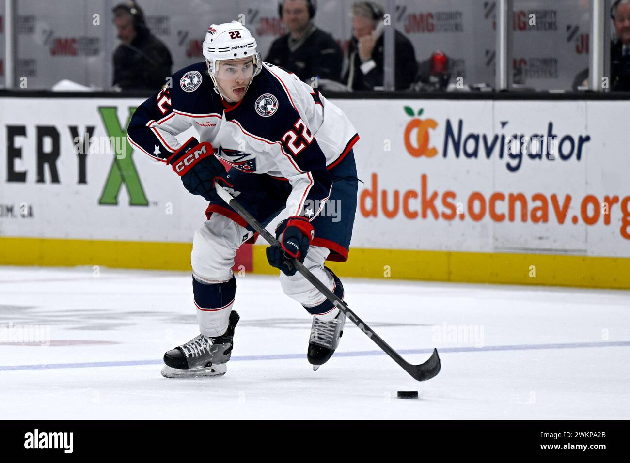 Columbus Blue Jackets defenseman Jake Bean (22) advances the puck ...