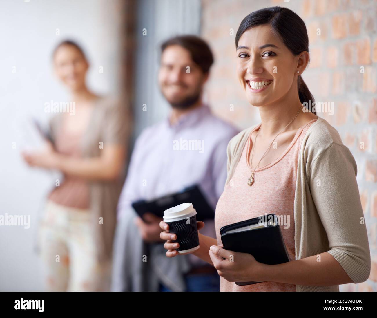 Businesswoman, coffee and portrait with smile by office building with ...