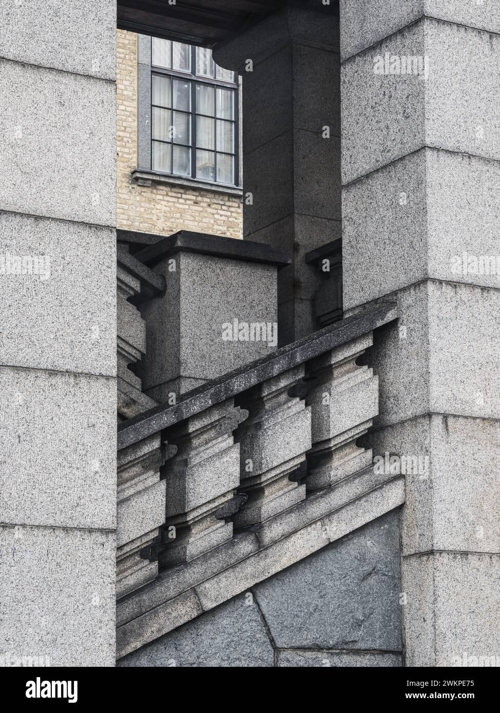 A unique view of a granite staircase juxtaposed against the external ...
