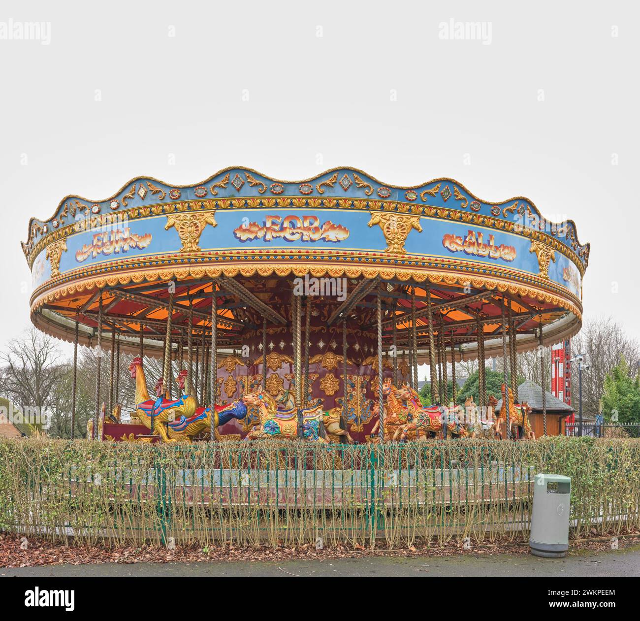 Carousel of horses in the children's play park at Wickstead Park ...