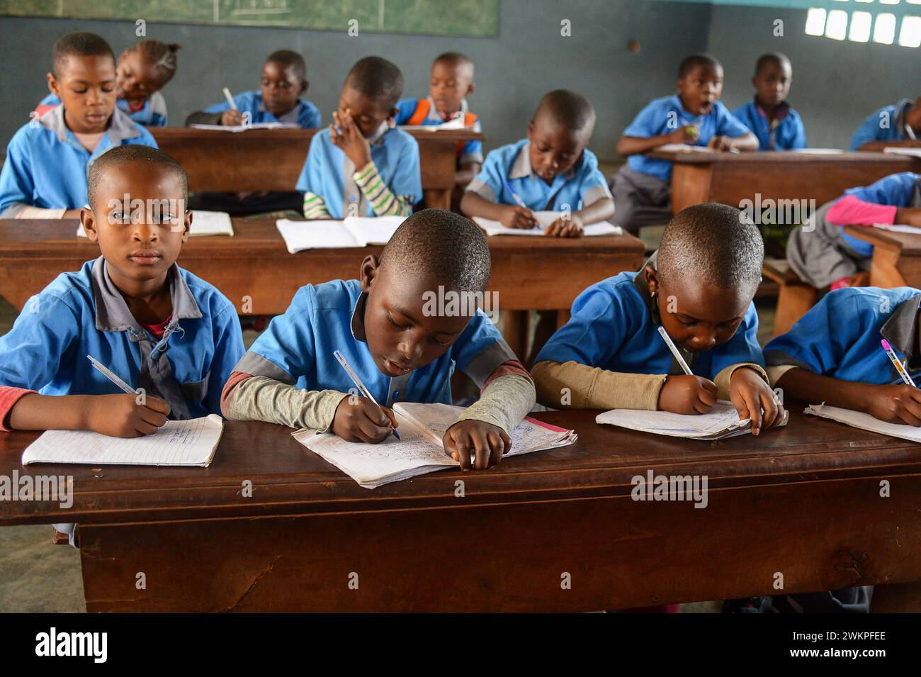 Yaounde, Cameroon. 19th Feb, 2024. Students take notes during a class ...