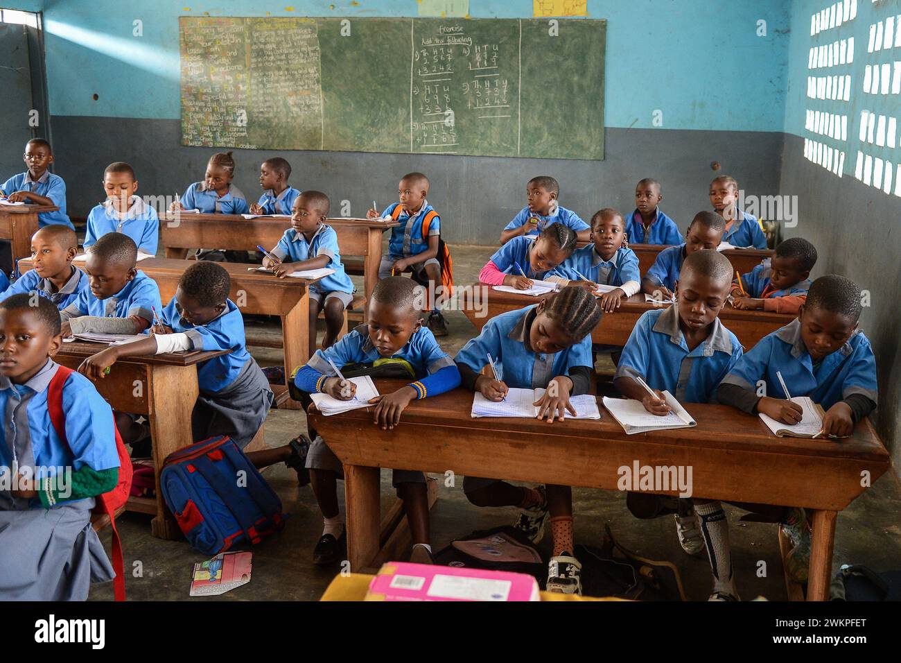 Yaounde, Cameroon. 19th Feb, 2024. Students take notes during a class ...