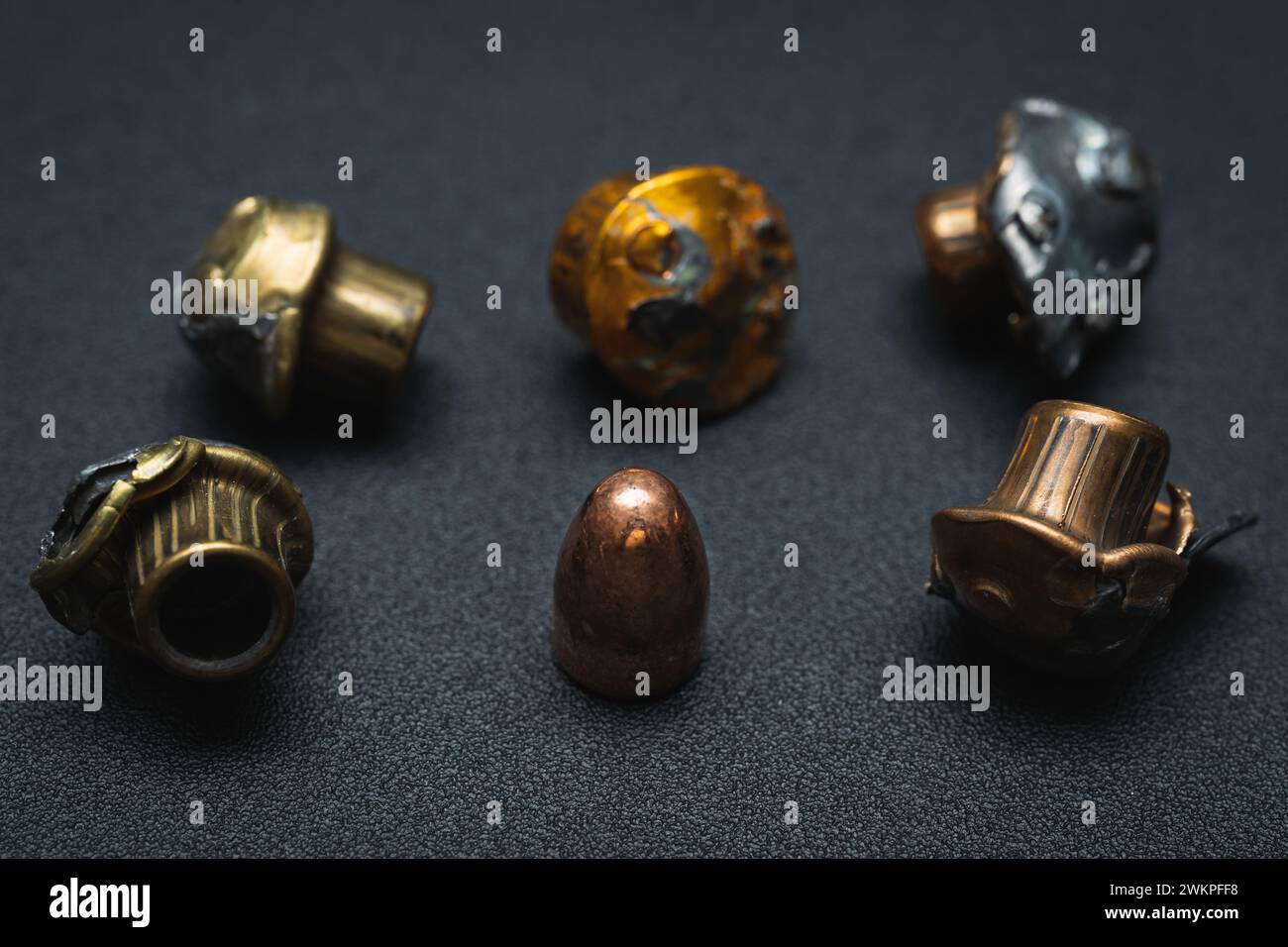 Crumpled spent bullets from a 9mm pistol. High quality photo Stock ...