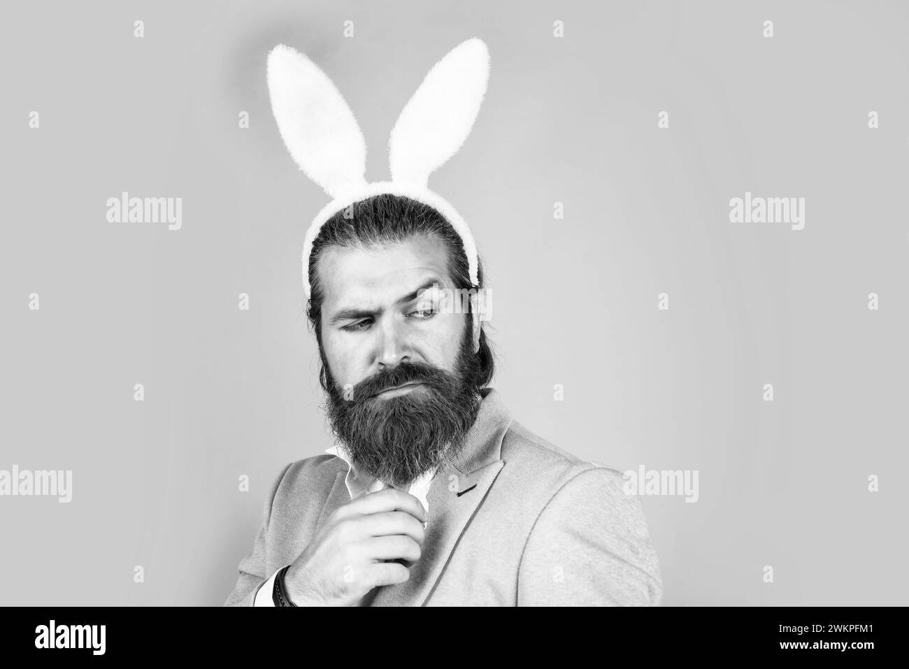 happy easter. man imagine he is rabbit. male wear bunny ears. just ...