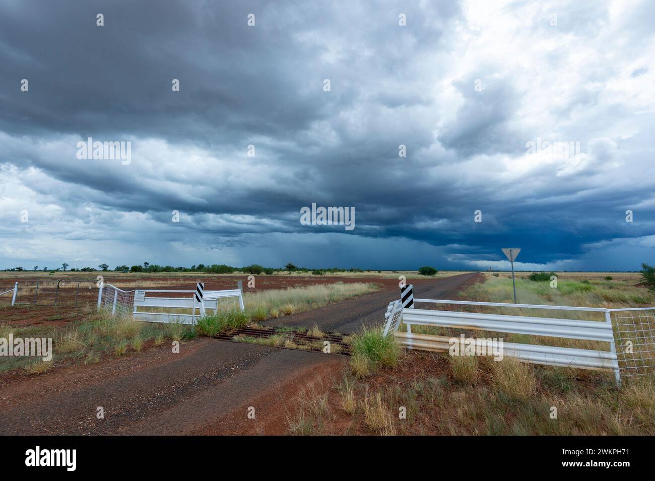 Stormy skies over farmland in the Australian Outback, near Cunnamulla ...