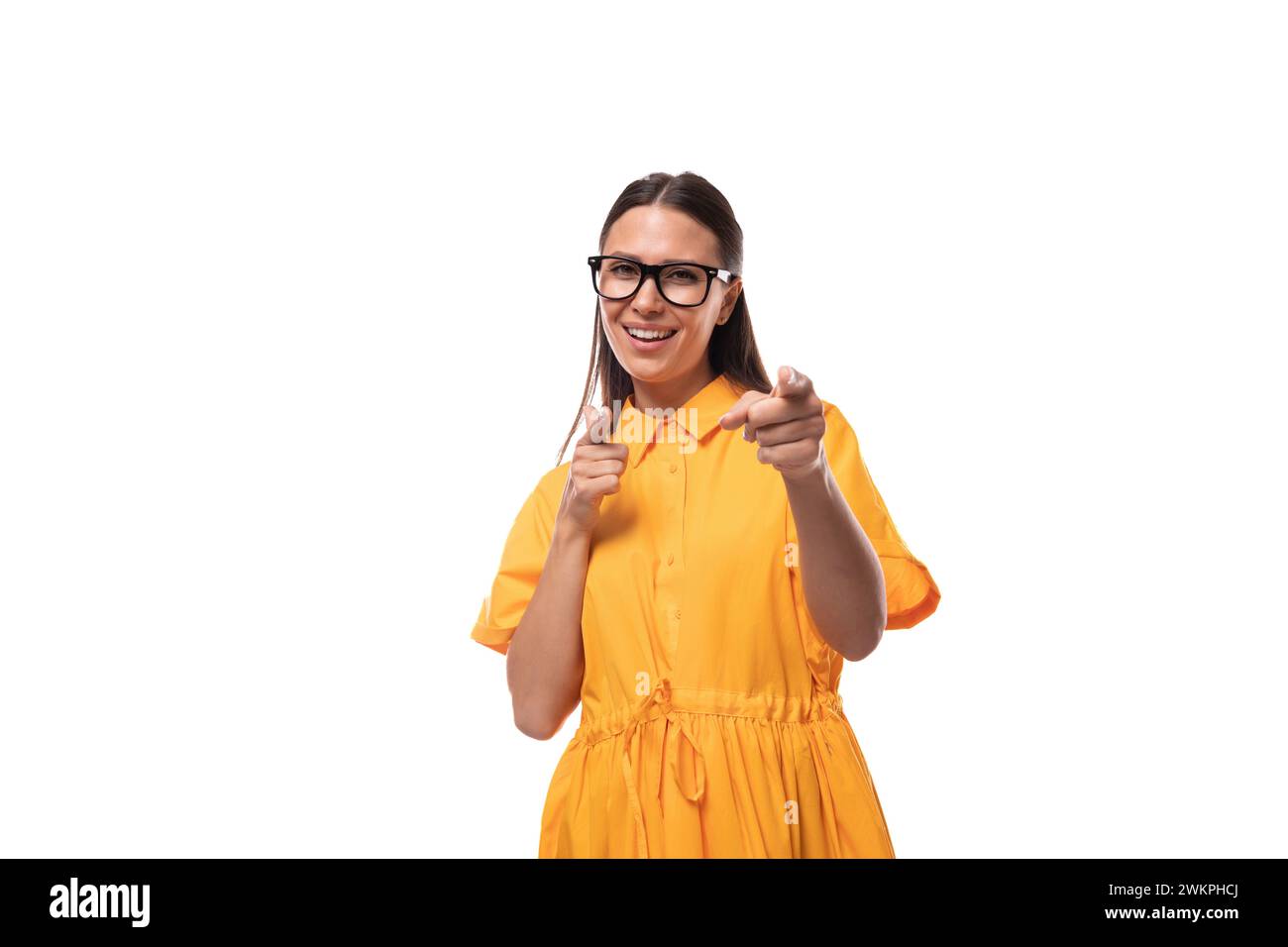 young pretty brunette lady dressed in yellow dress inspired by an idea ...