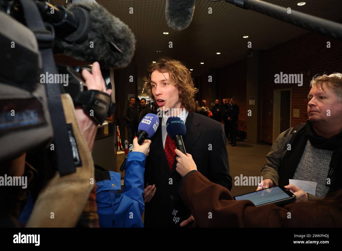 YouTuber Acid (Nathan Vandergunst) talks to the press as he arrives for ...
