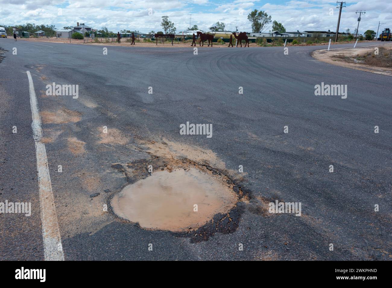 Road damaged by ex tropical cyclone Kirrily in the Australian Outback ...