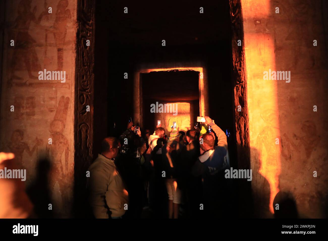 Aswan, Egypt. 22nd Feb, 2024. Tourists take photos of sculptures ...