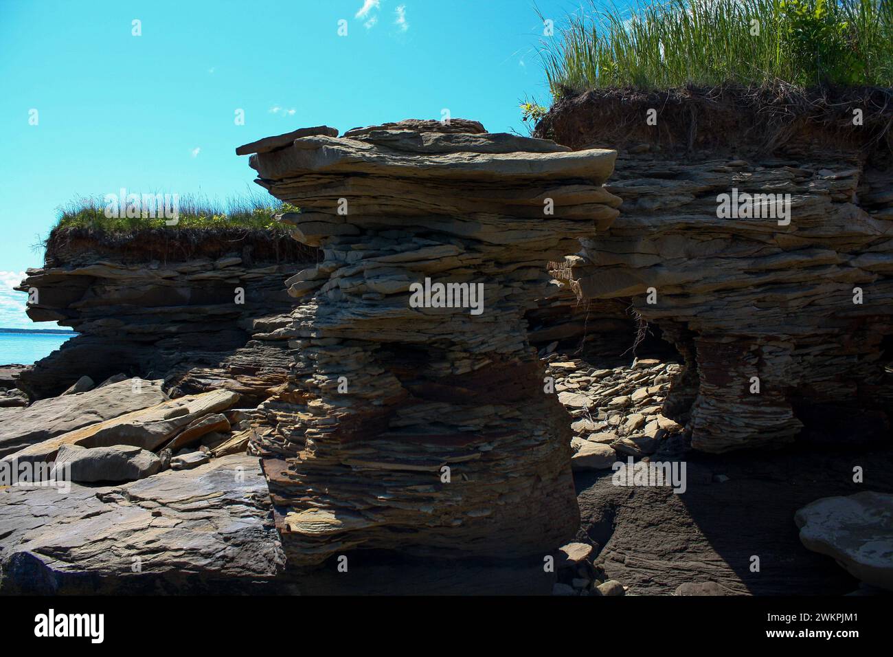 The rocky shore of Shediac Island, New Brunswick, Canada Stock Photo ...