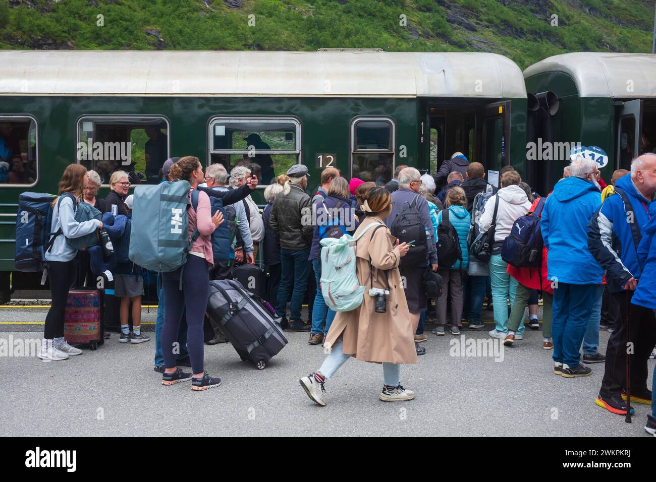 Flam, Norway, June 24, 2023: Travelers board the famous Flamsbana ...