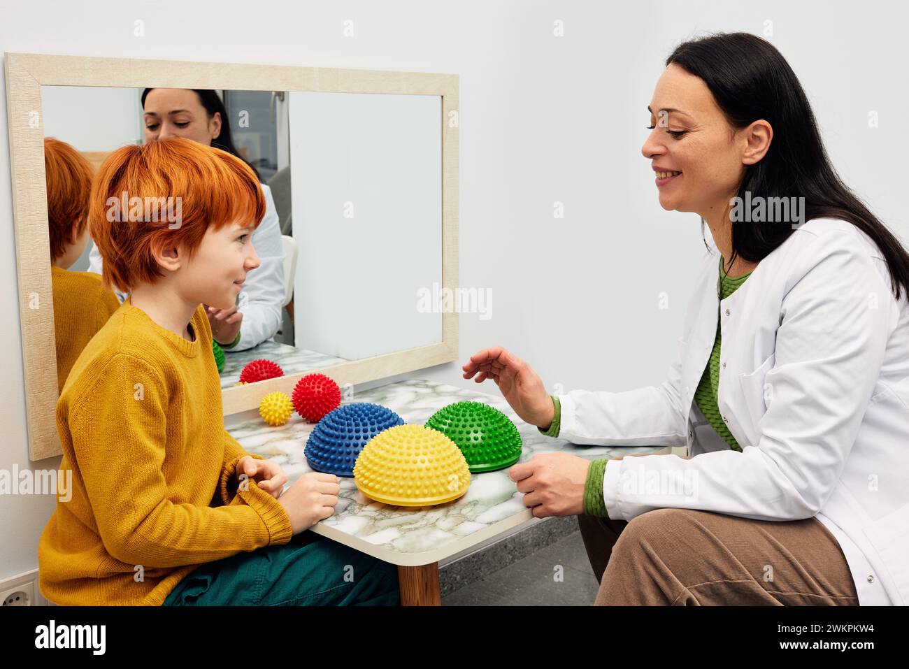 Sensory integration therapy in paediatric rehabilitation Stock Photo ...