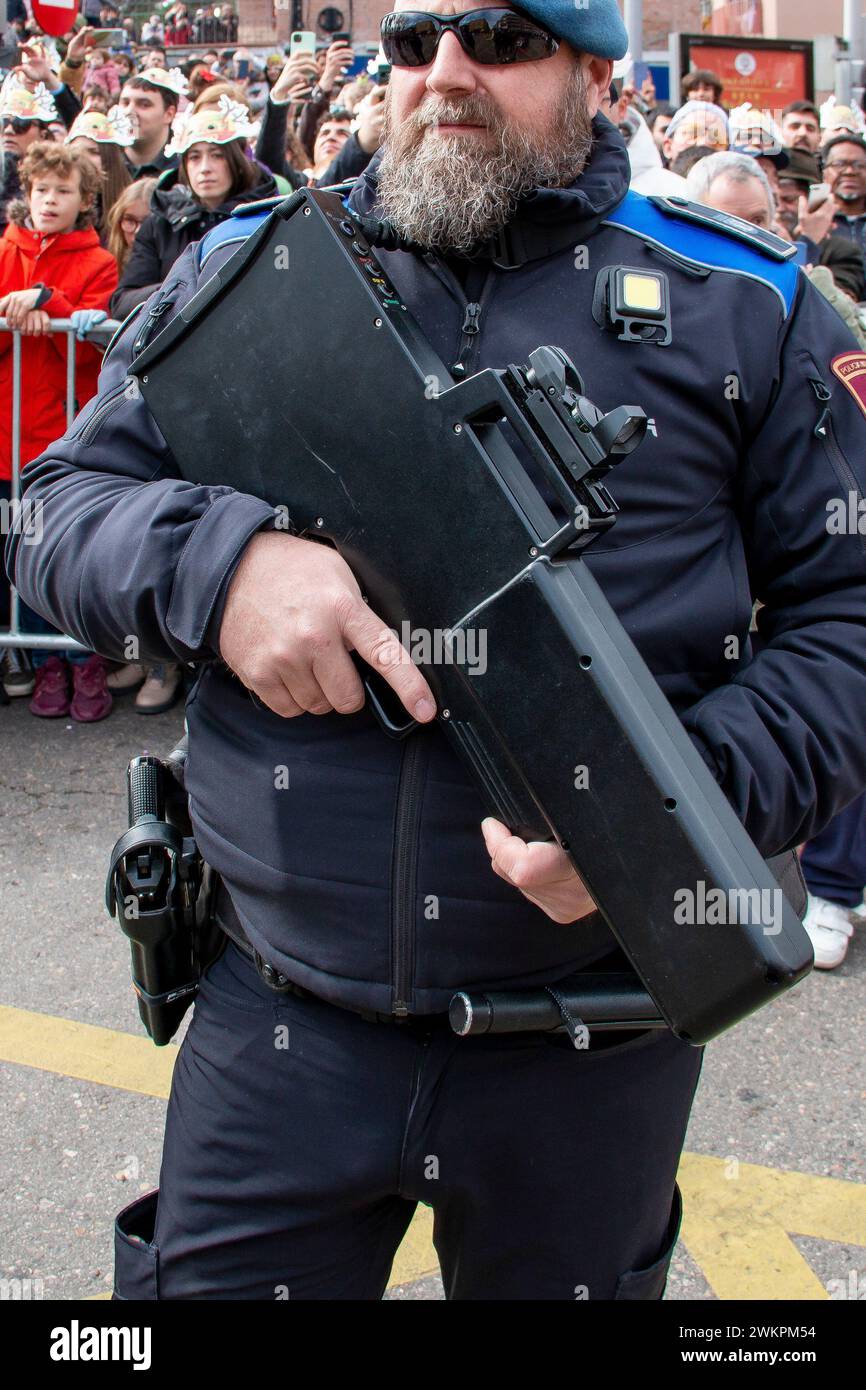 Police officer of the city of Madrid carrying a weapon to shoot down ...