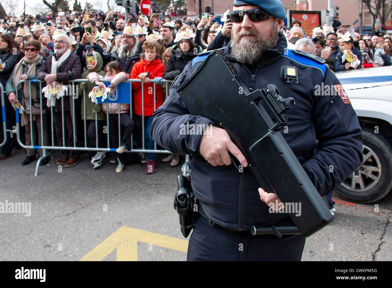Police officer of the city of Madrid carrying a weapon to shoot down ...