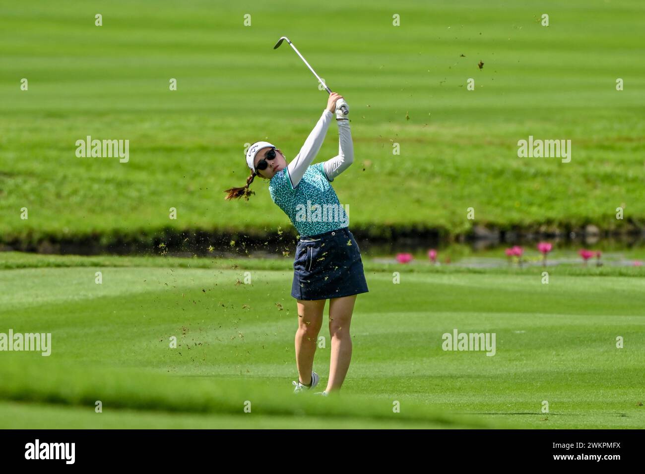 Yuna Nishimura of Japan watches her shot on the 15th fairway during the ...