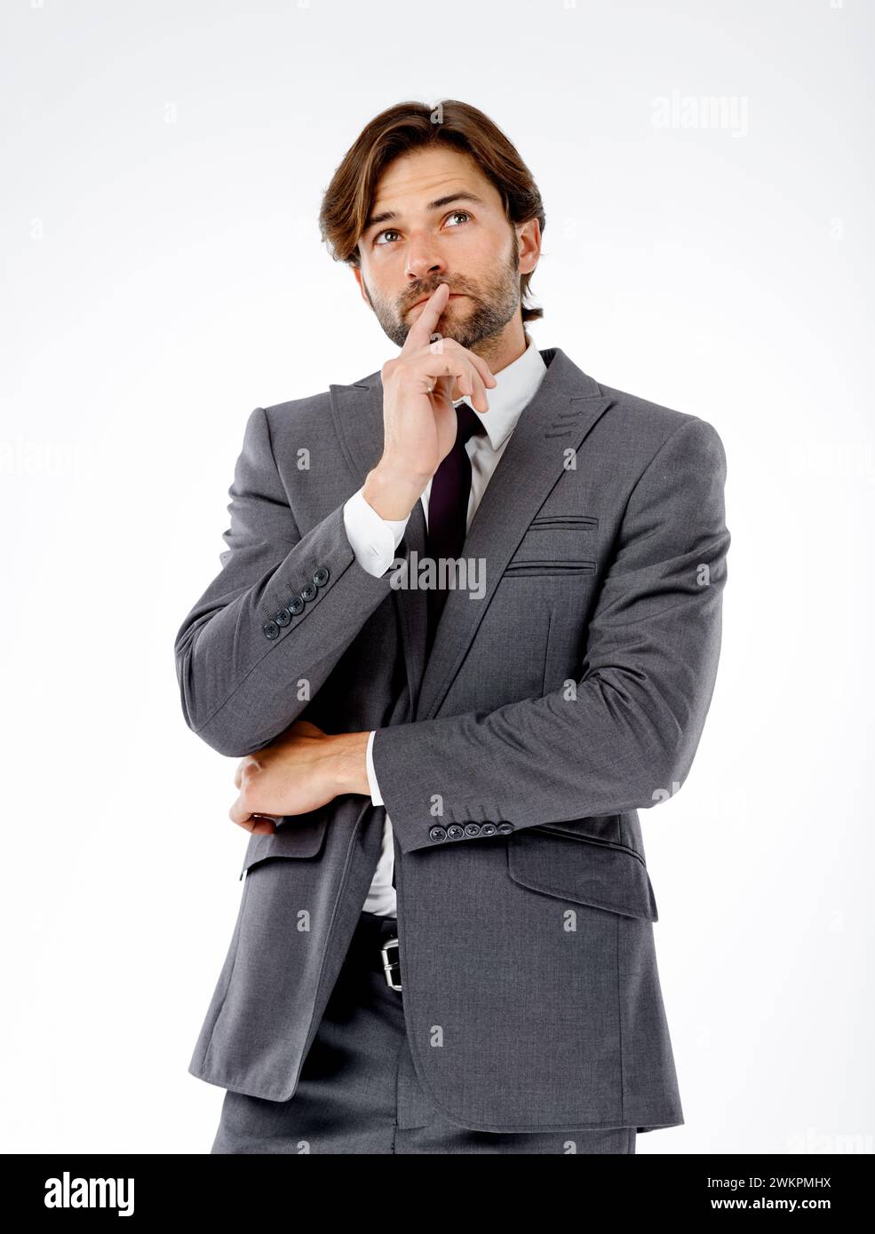 Businessman, thinking and fashion with decision, choice or idea on a ...