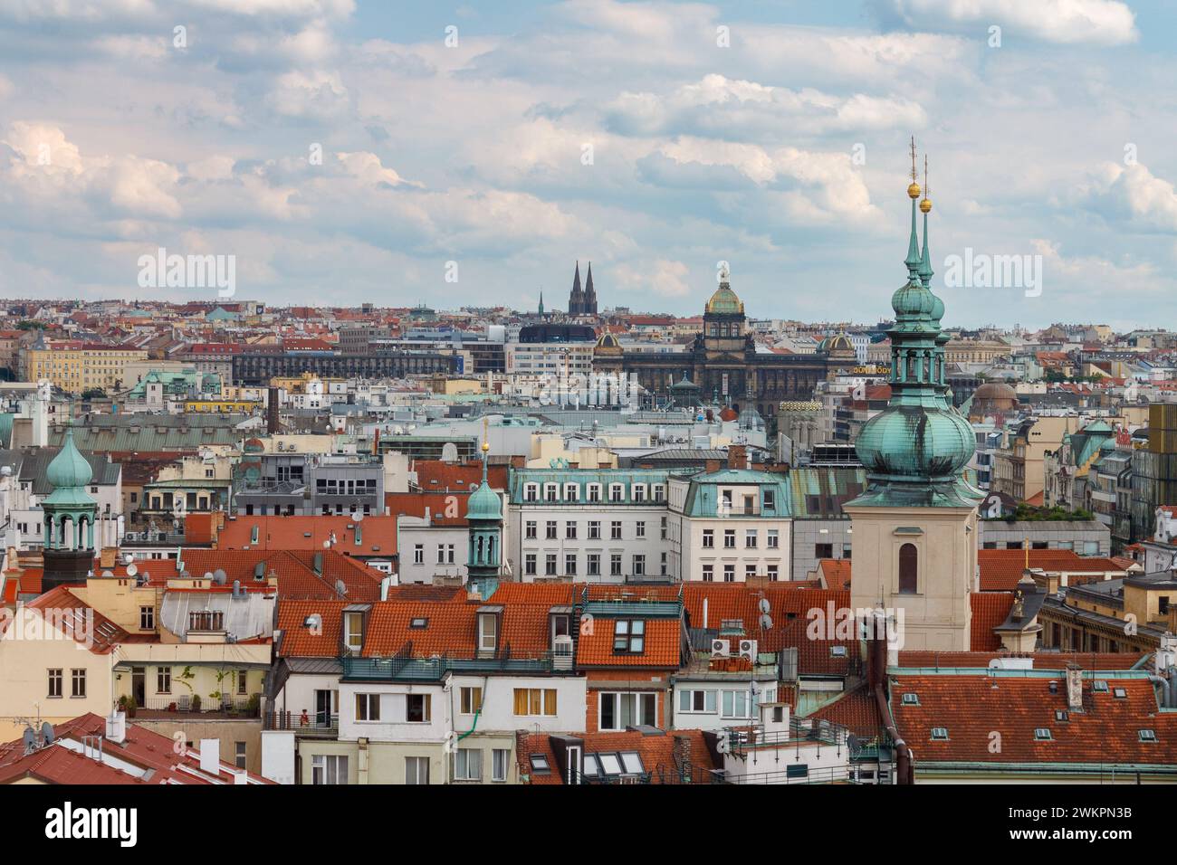 An aerial view of the rooftops of the historical buildings in Prague ...