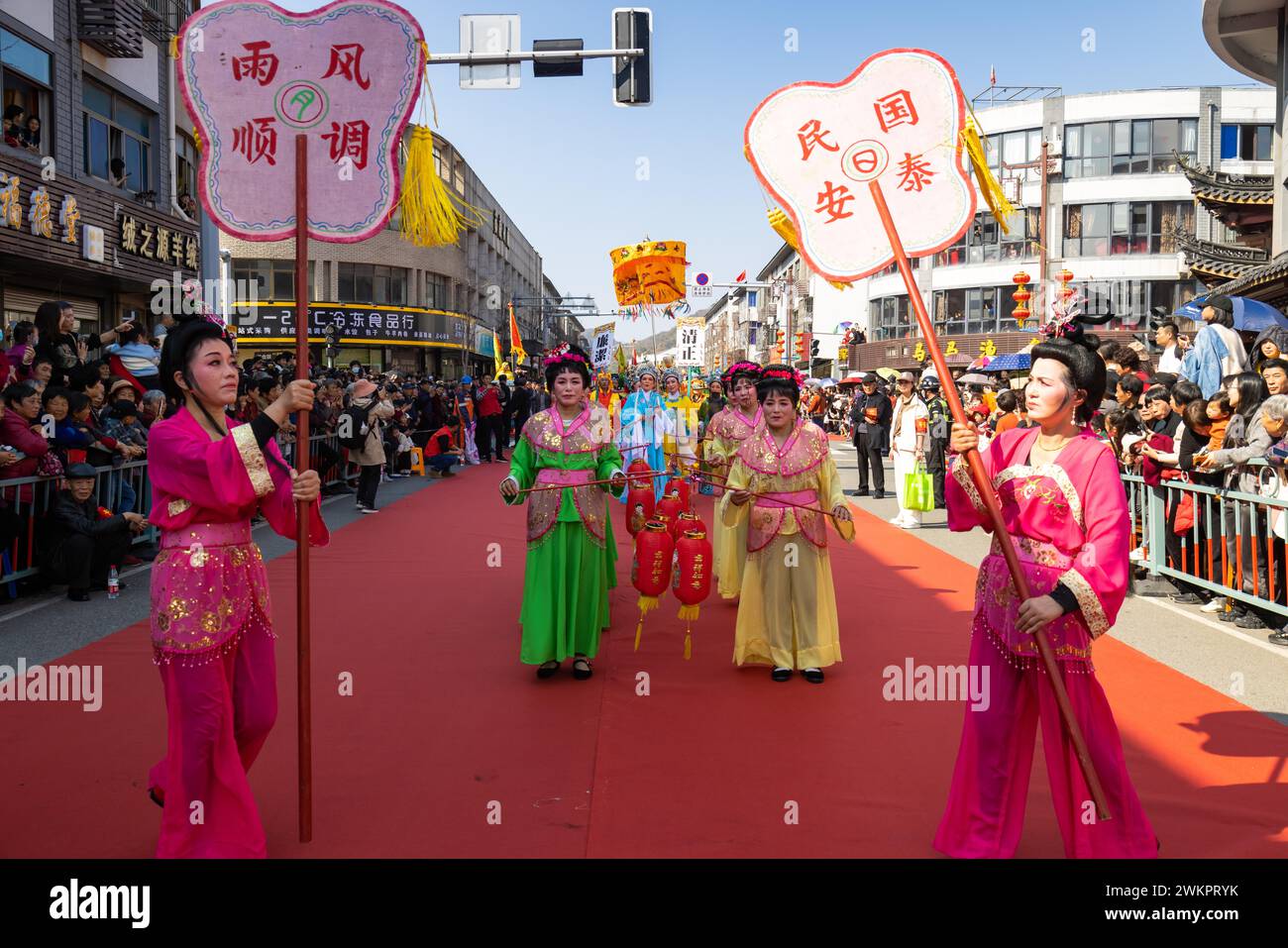 Folk actors perform on the street to welcome Lantern Festival in Ningbo ...