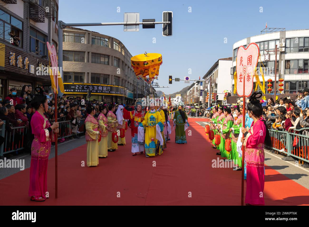 Folk actors perform on the street to welcome Lantern Festival in Ningbo ...