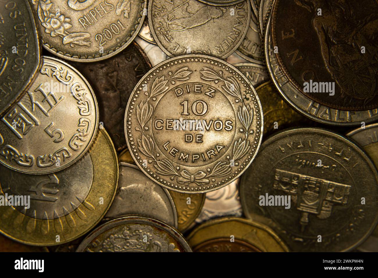 A stack of coins with a 10 centavo de lempira in the middle Stock Photo ...