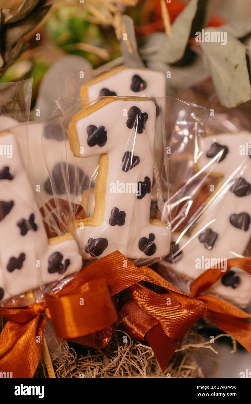 A vertical of a number one-shaped cake for a first birthday celebration ...