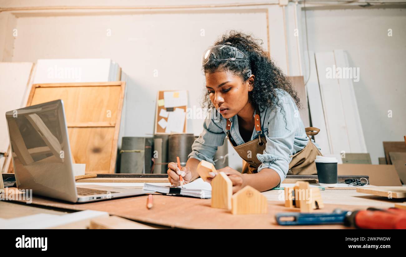 Carpenter america black woman curly hair sketch work and making notes ...
