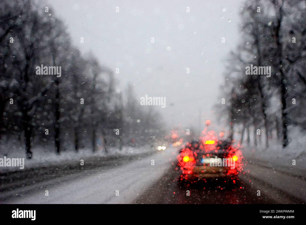Poor visibility through the windshield in rain and snow, Munich ...