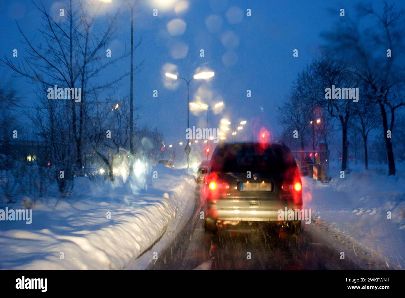 Poor visibility through the windshield in rain and snow, Munich ...