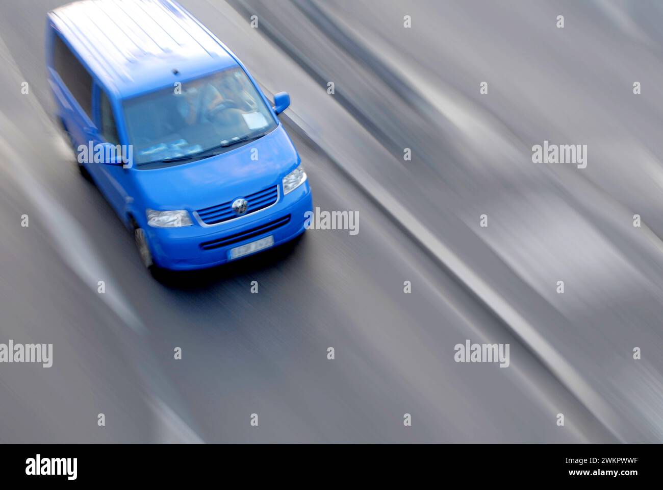 blue VW van volkswagen car in motion Stock Photo - Alamy