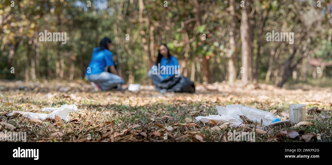 Garbage collect volunteer collect up plastic bottles put garbage at ... Garbage collect volunteer collect up plastic bottles put garbage at ...