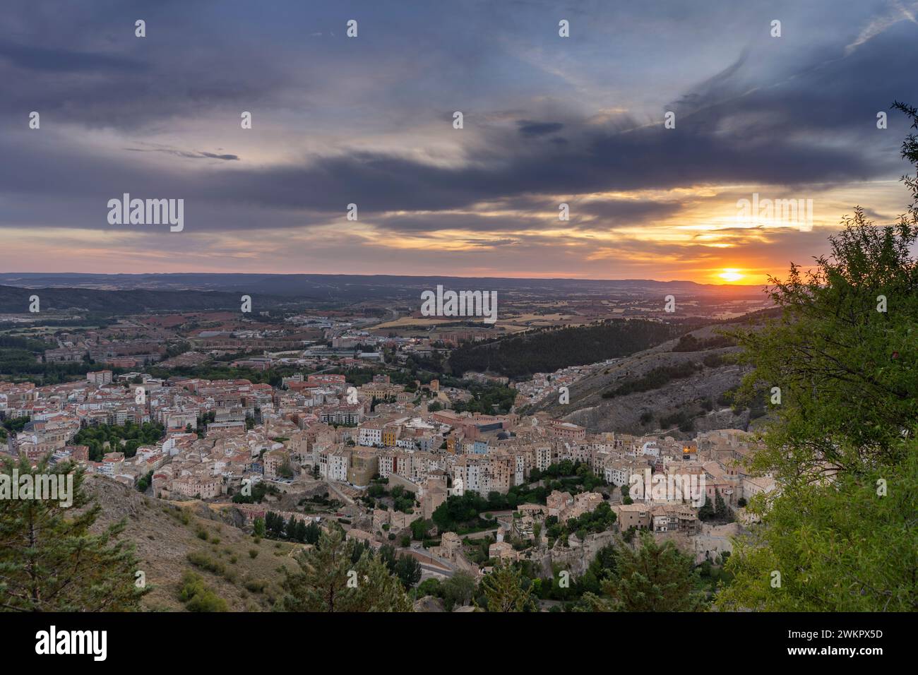 Spectacular sunset of the medieval city of Cuenca with intense colors ...