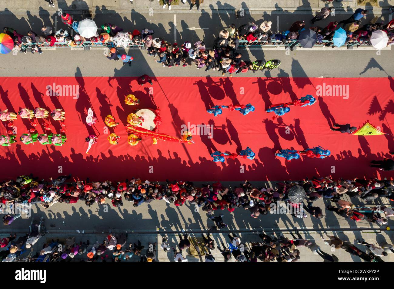 Folk actors perform on the street to welcome Lantern Festival in Ningbo ...