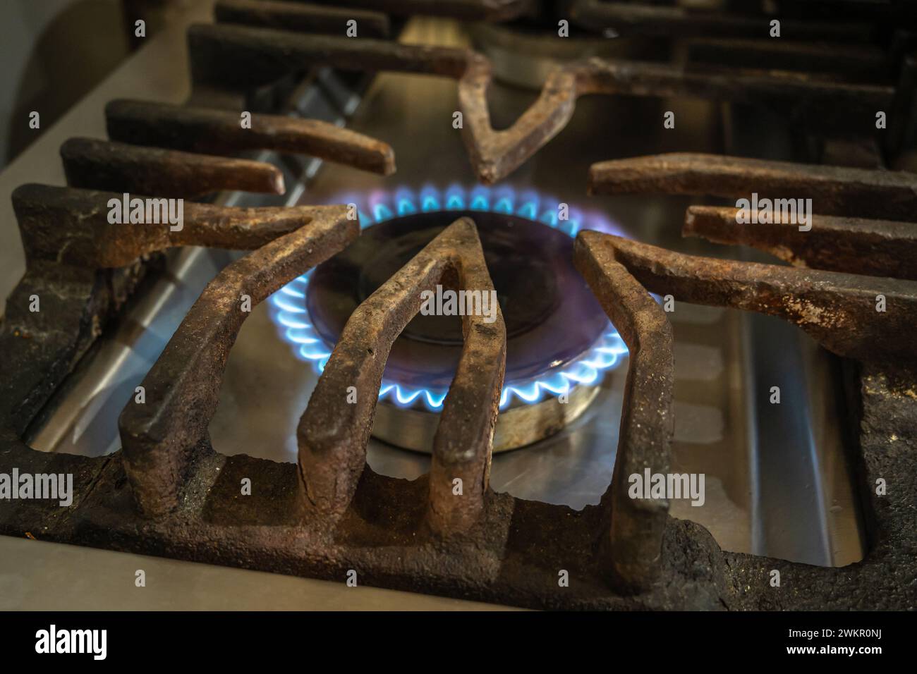Natural gas stove on. Gas consumption concept Stock Photo - Alamy
