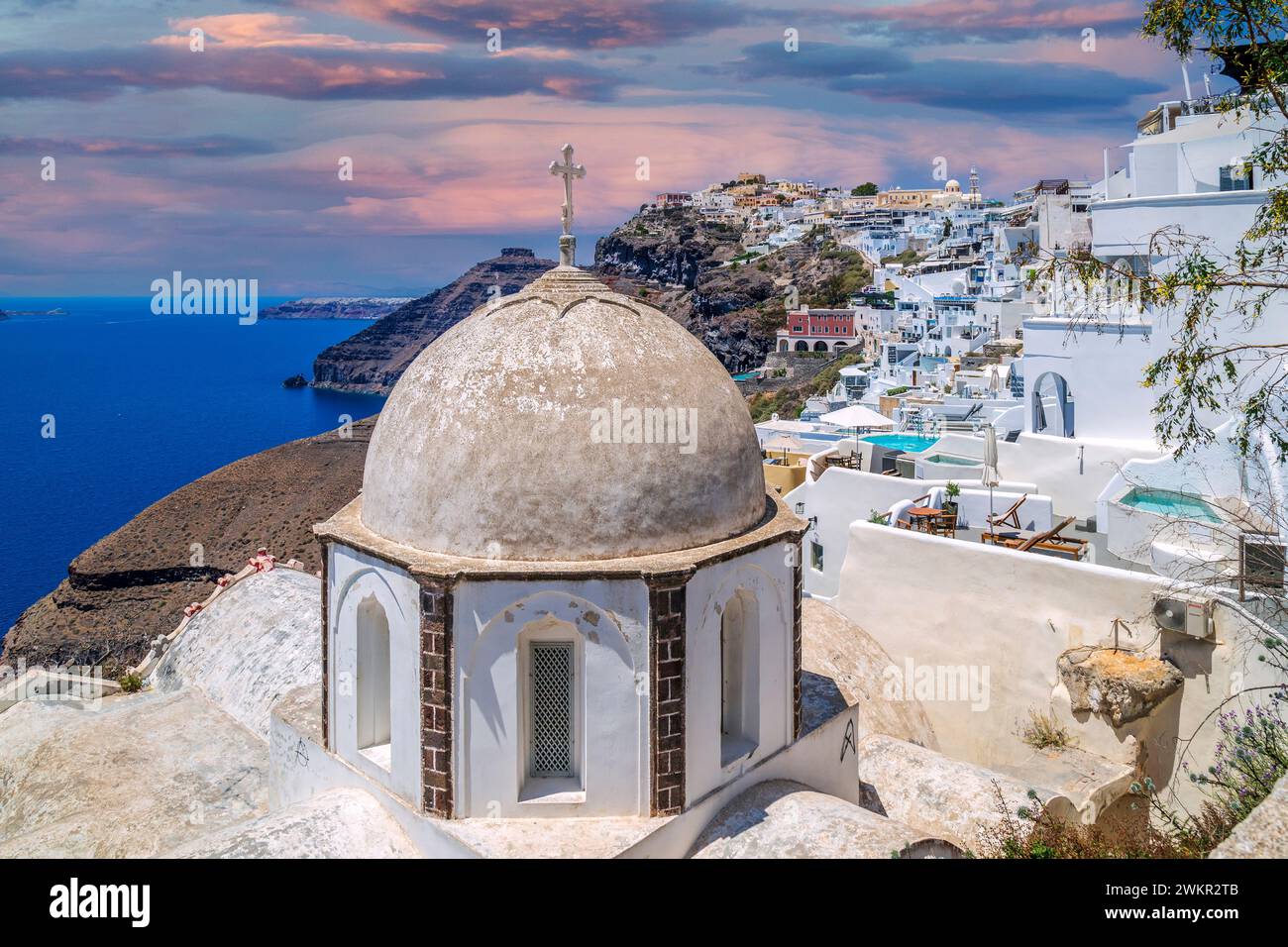 Typical white and blue architecture with domes and churches of Fira ...