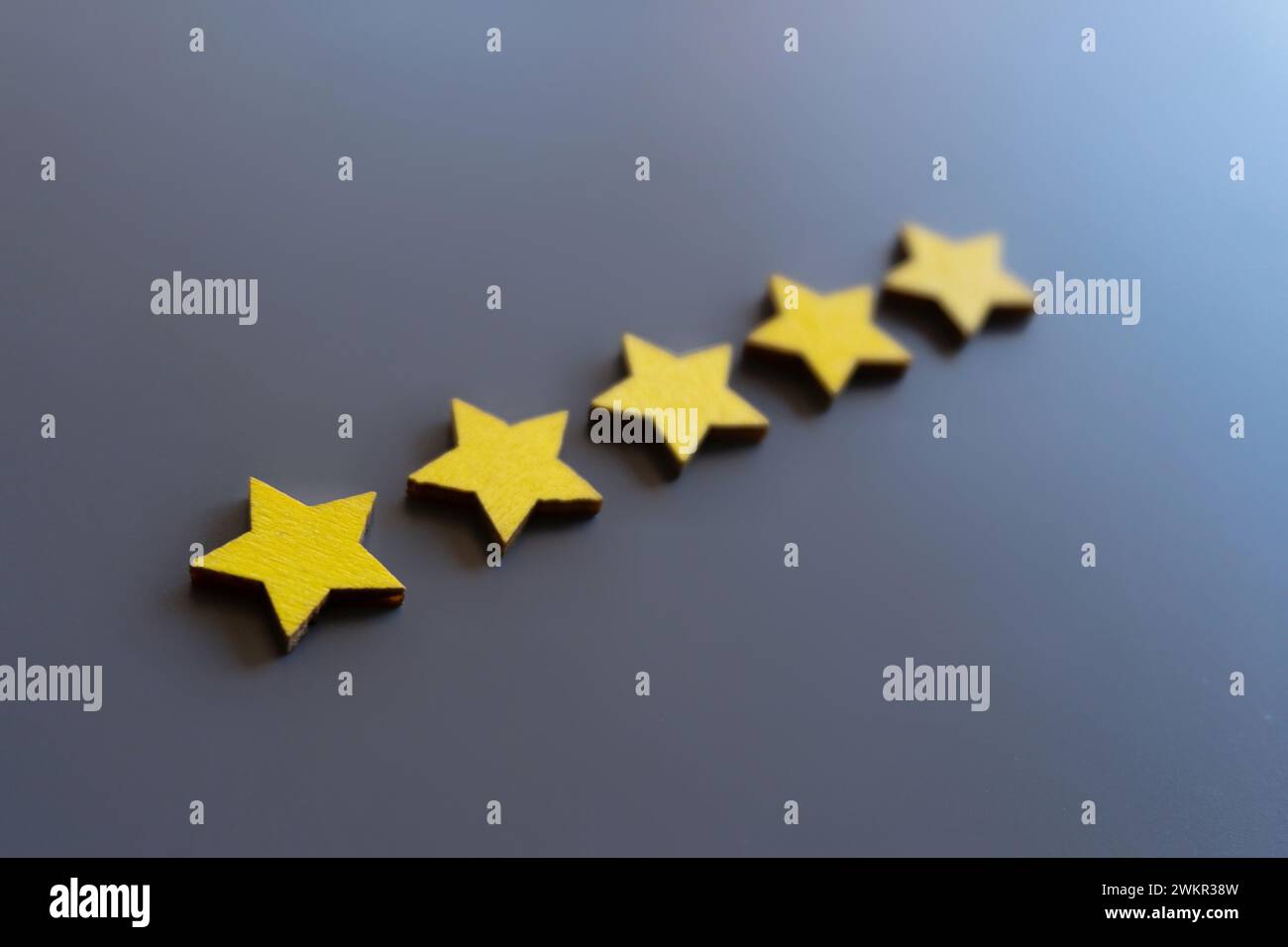 Top view image of yellow five star shape. Feedback, review, rating and ...
